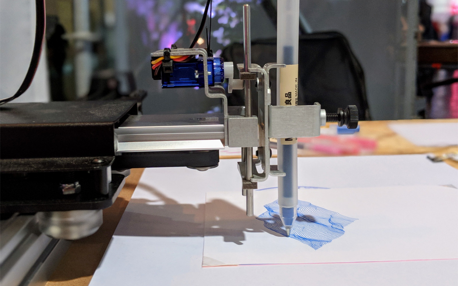 Drawing Robot AxiDraw: The perfect conference gadget | Insights | Ubilabs Drawing Robot AxiDraw: The perfect conference gadget | Insights | Ubilabs